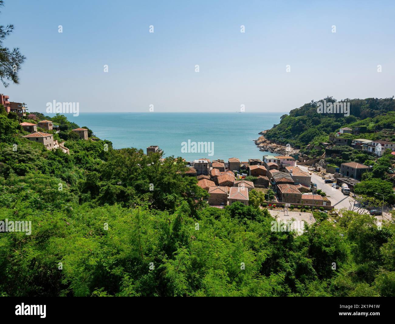 Sunny view of the Jinsha Village cityscape with beach view at Matsu ...
