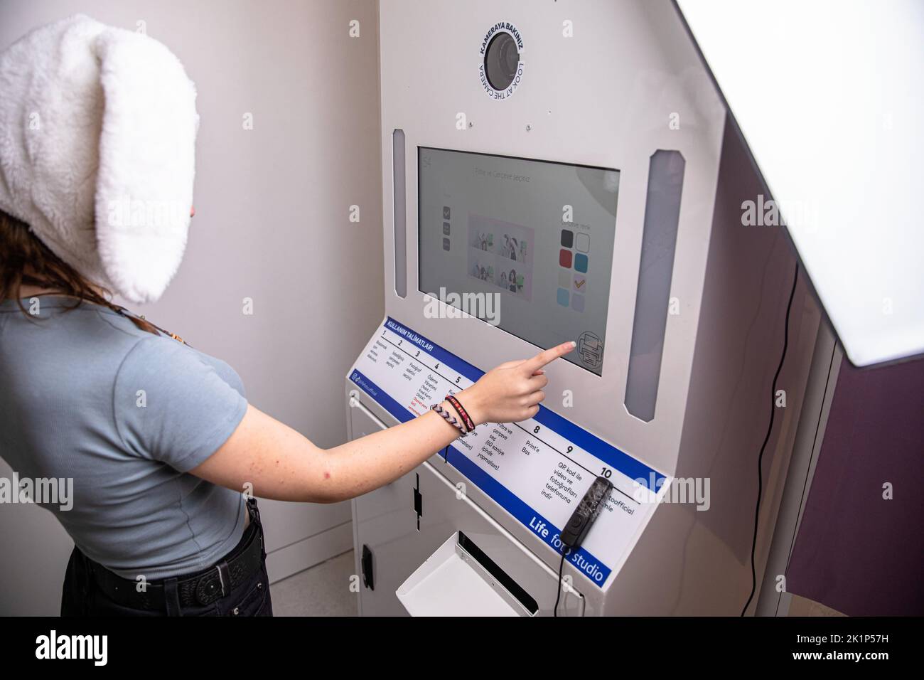 Woman seen inside booth hi-res stock photography and images - Alamy