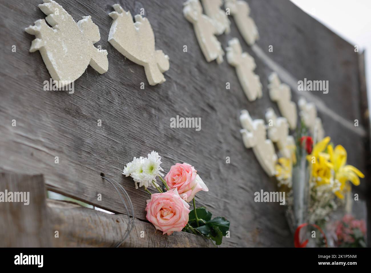 Flowers set on the wall to remains of Rebsamen School during the ...