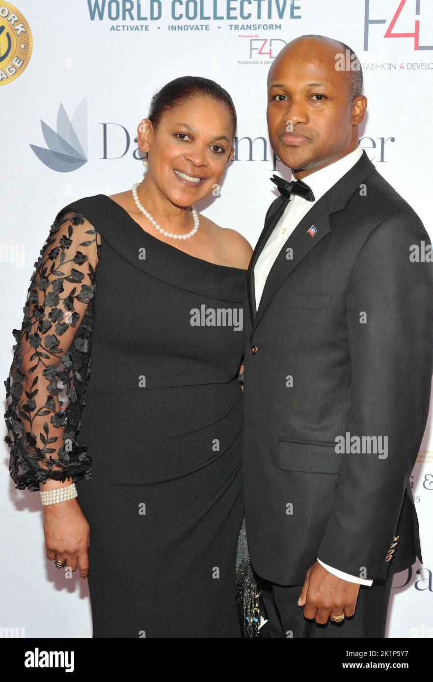 Jude Elie (R) and guest attend the Fashion4Development 2nd Annual ...