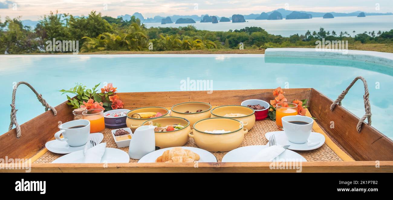 Floating Breakfast tray in swimming pool at luxury hotel or tropical ...