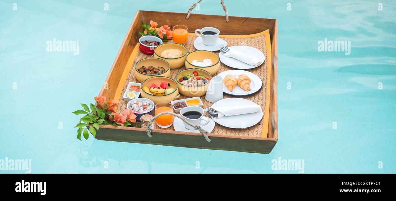 Floating Breakfast tray in swimming pool at luxury hotel or tropical ...
