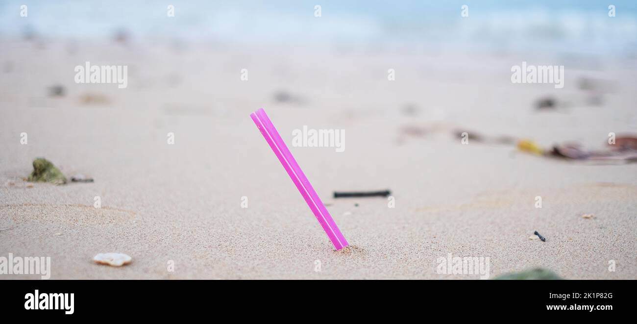 plastic Straw garbage on the beach. Ecology, Environmental, pollution ...