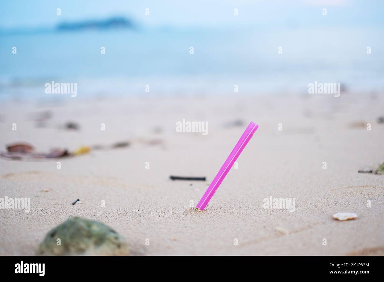 plastic Straw garbage on the beach. Ecology, Environmental, pollution ...
