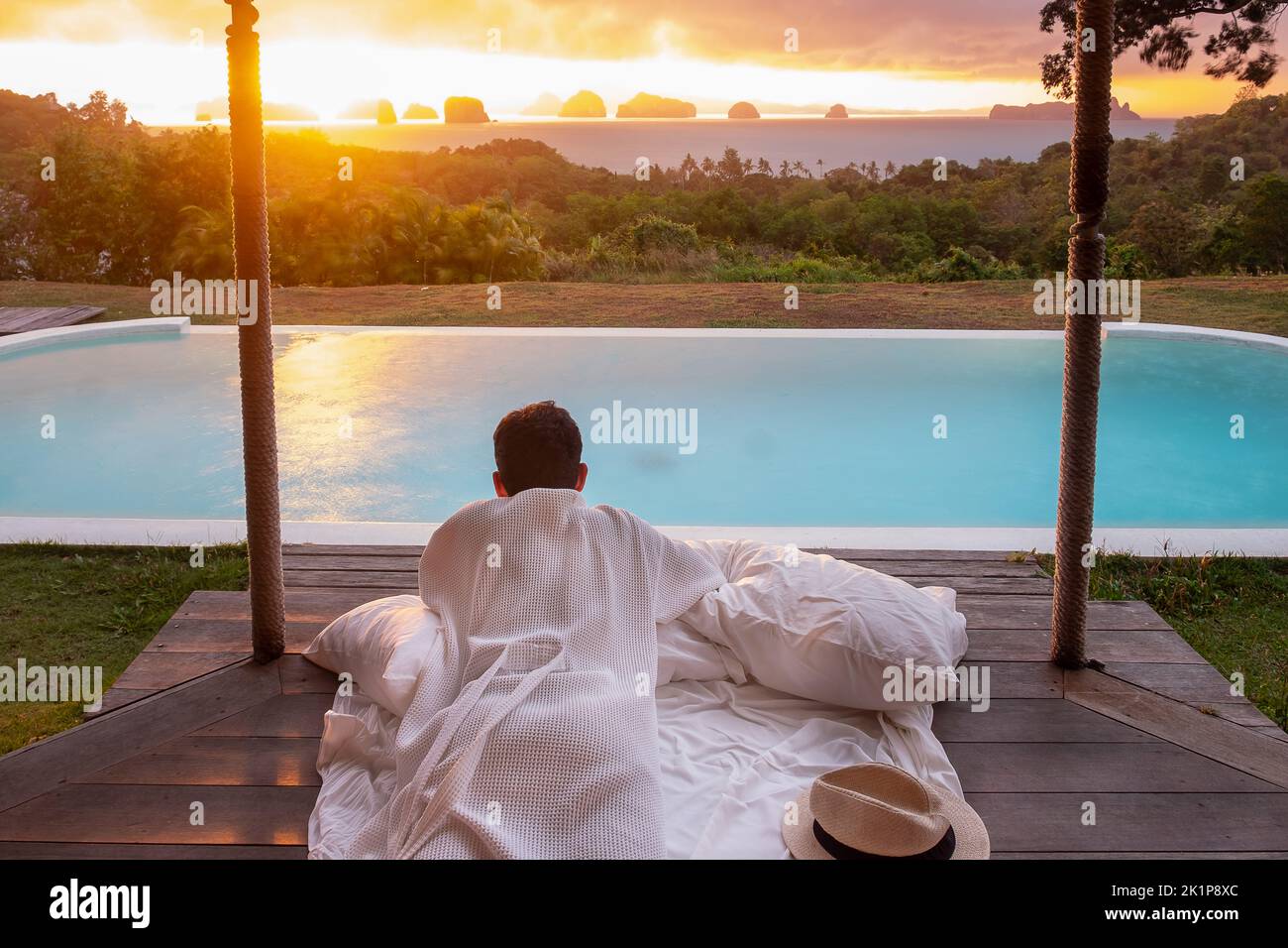 Happy man traveler enjoy Beautiful ocean view, Tourist relaxing in ...