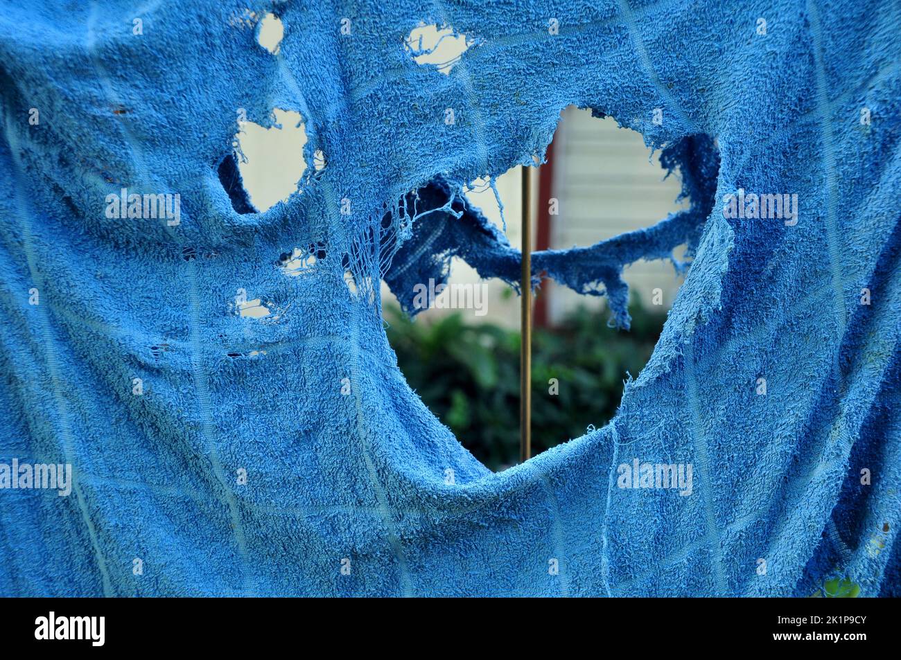 Torn cloth fence hi-res stock photography and images - Alamy