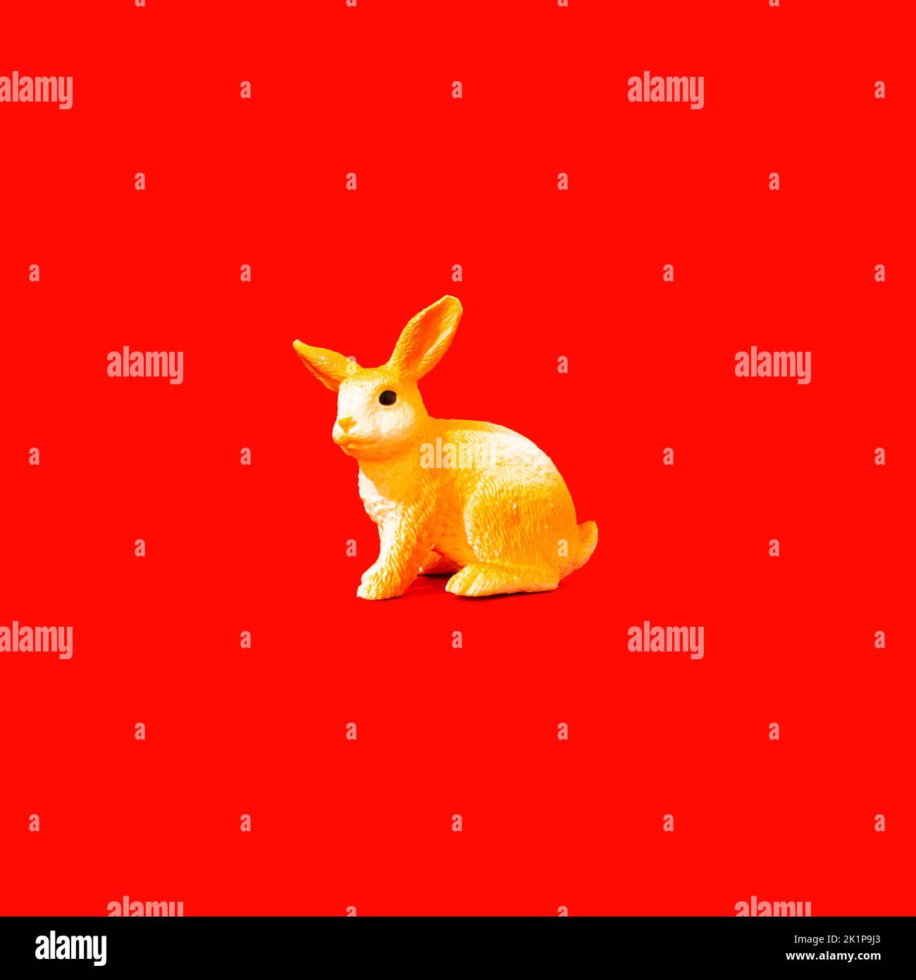 Yellow bunny on a red background. Conceptual banner idea for the ...