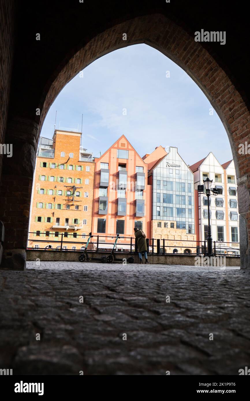 Old town in Gdansk. The riverside on Granary Island reflection in ...