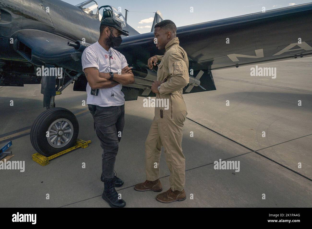 DEVOTION, from left: director J.D. Dillard, Jonathan Majors, on set ...