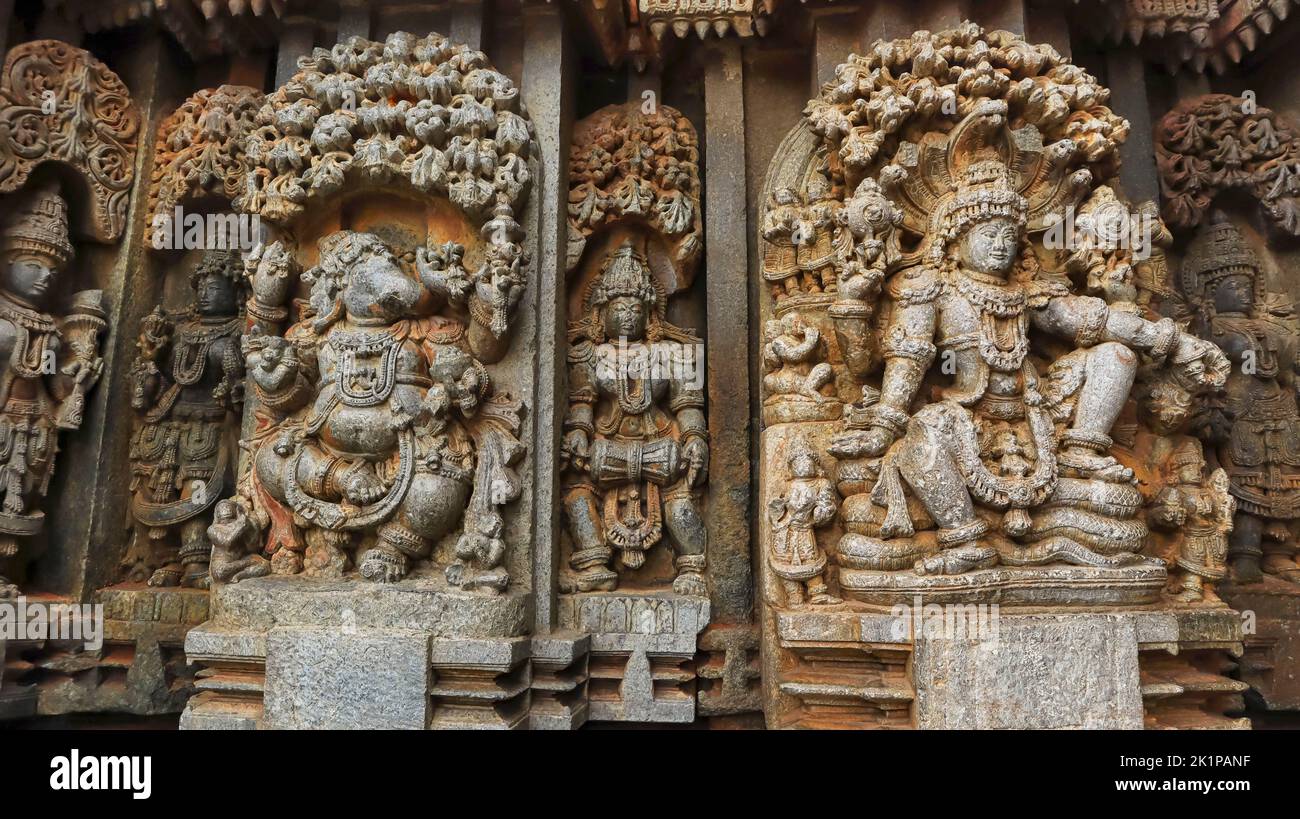 Carvings of Lord Ganesha and Lord Vishnu Sitting on the Snake at ...