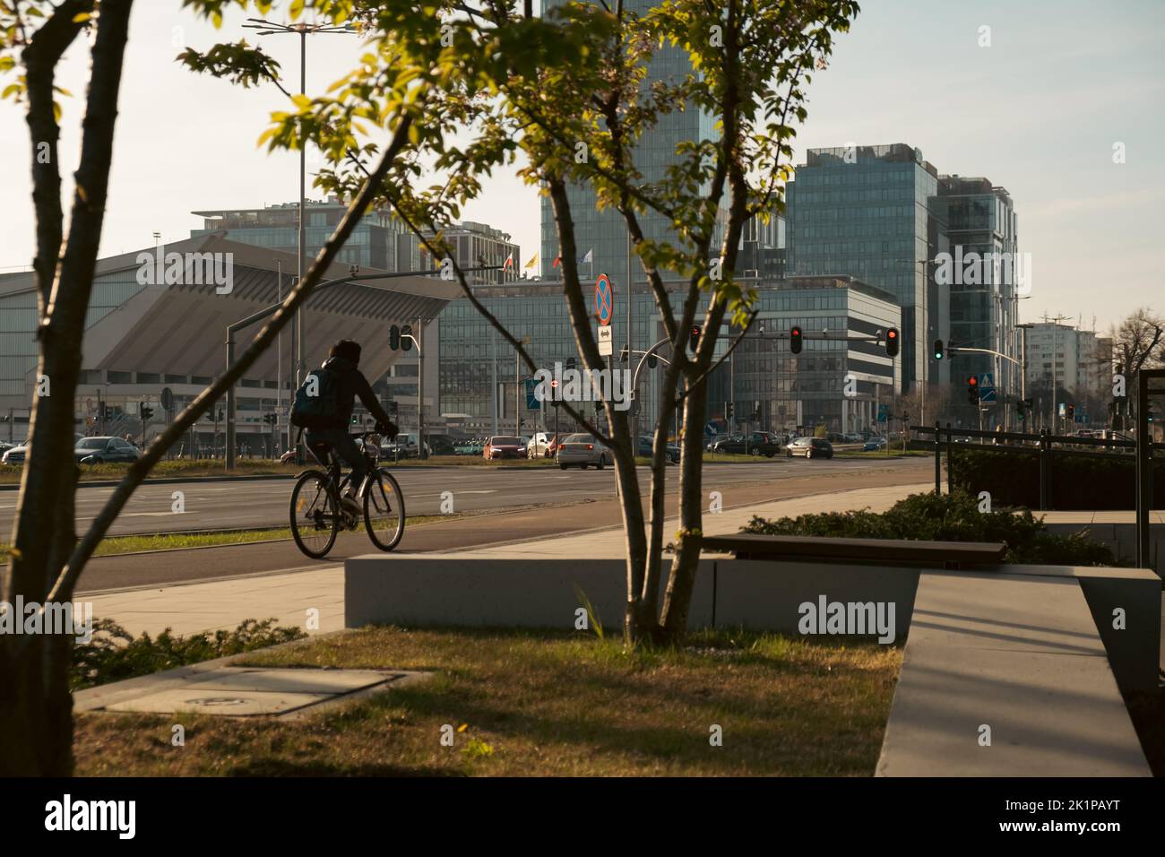 Man rides a bike public transport scene in Gdansk. Oliva business ...