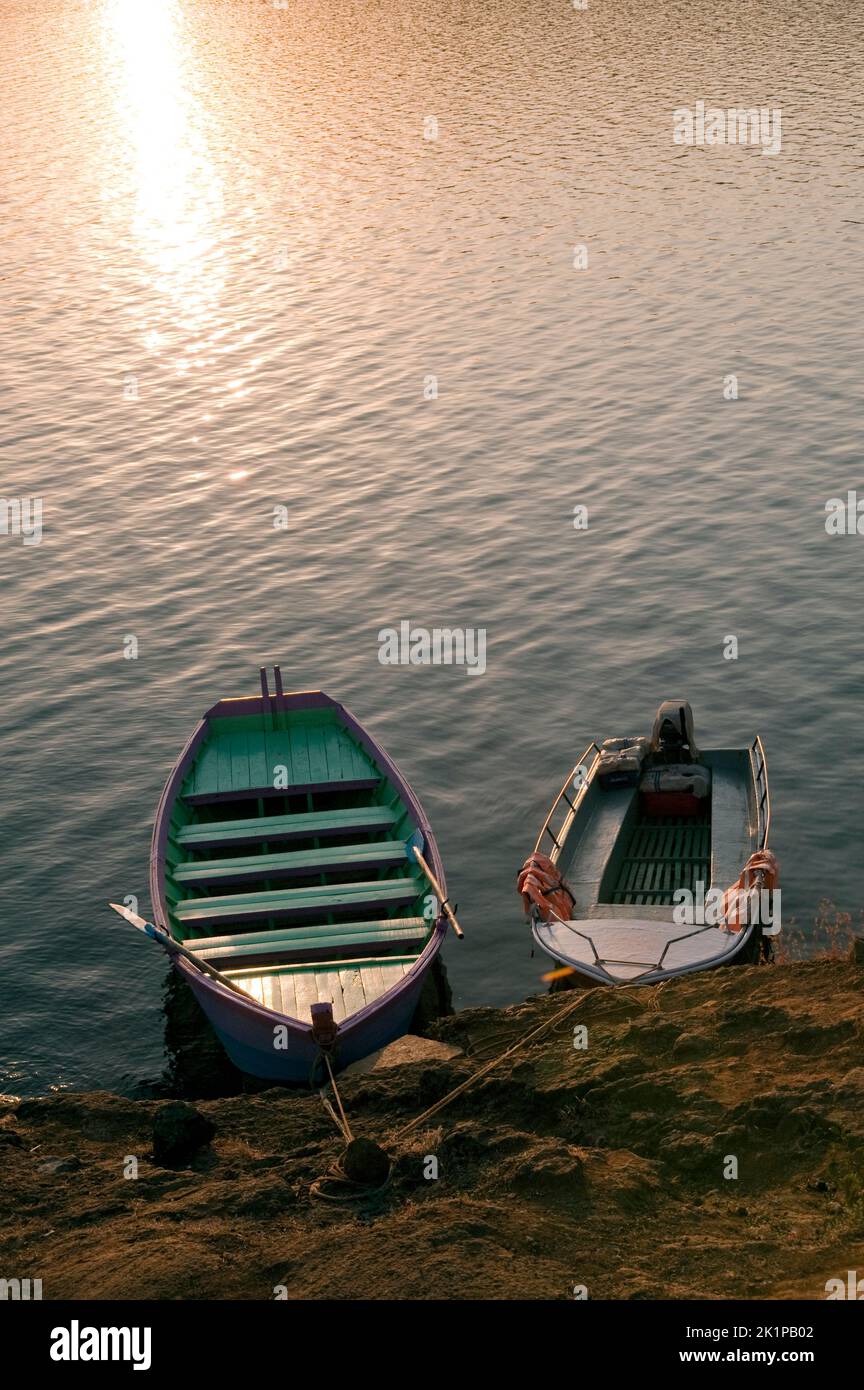Two boats tide on the bank of dam near Bhandardara taluka Akola ...