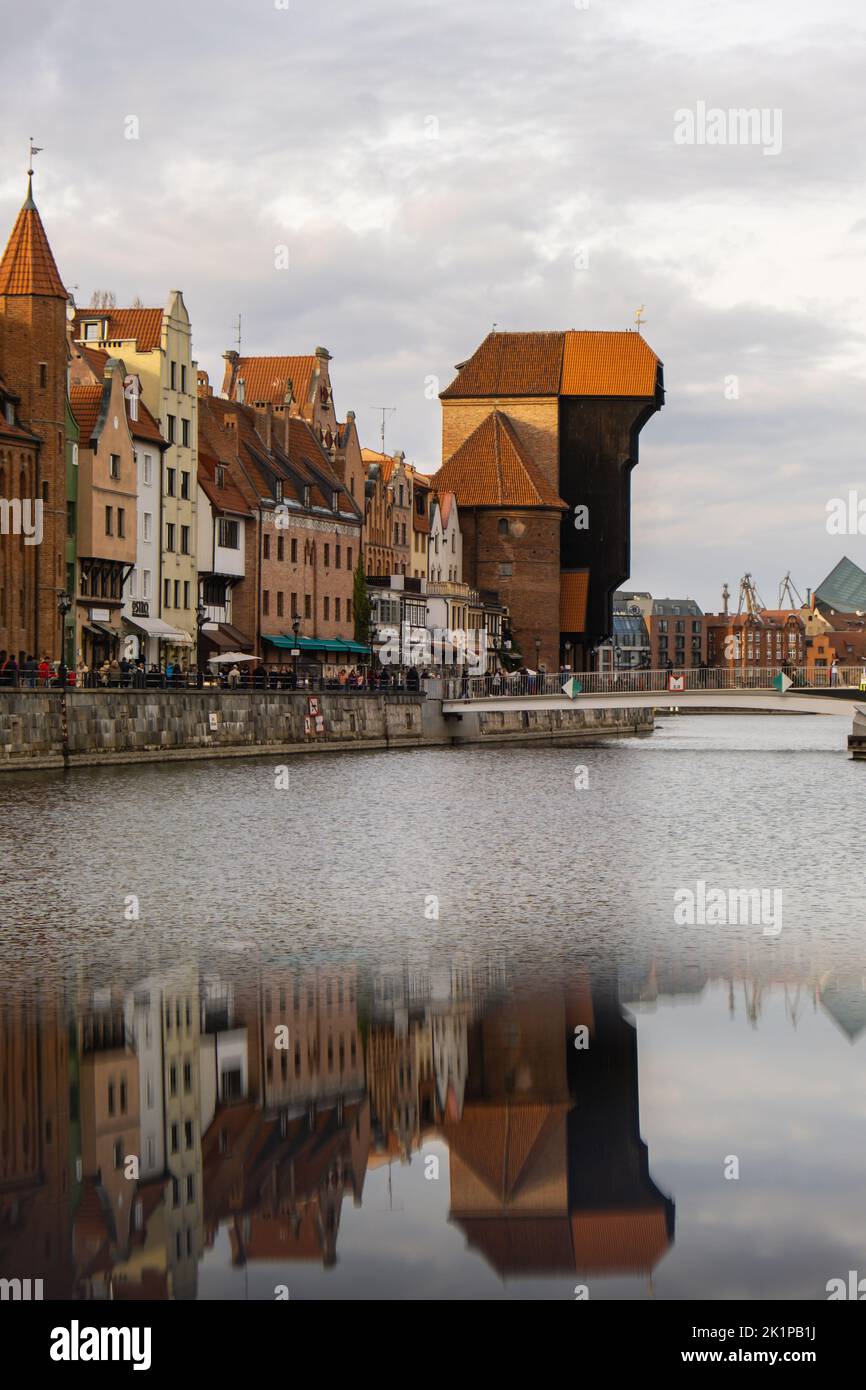 Ancient crane - zuraw Old town in Gdansk. The riverside on Granary ...