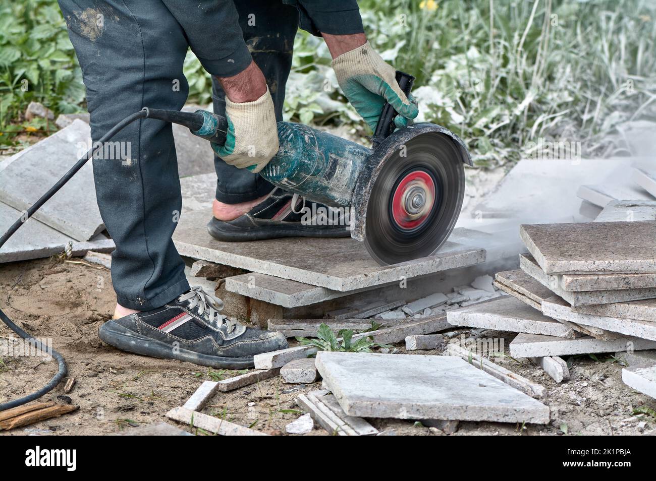 Construction worker cutting marble tile hi-res stock photography and ...