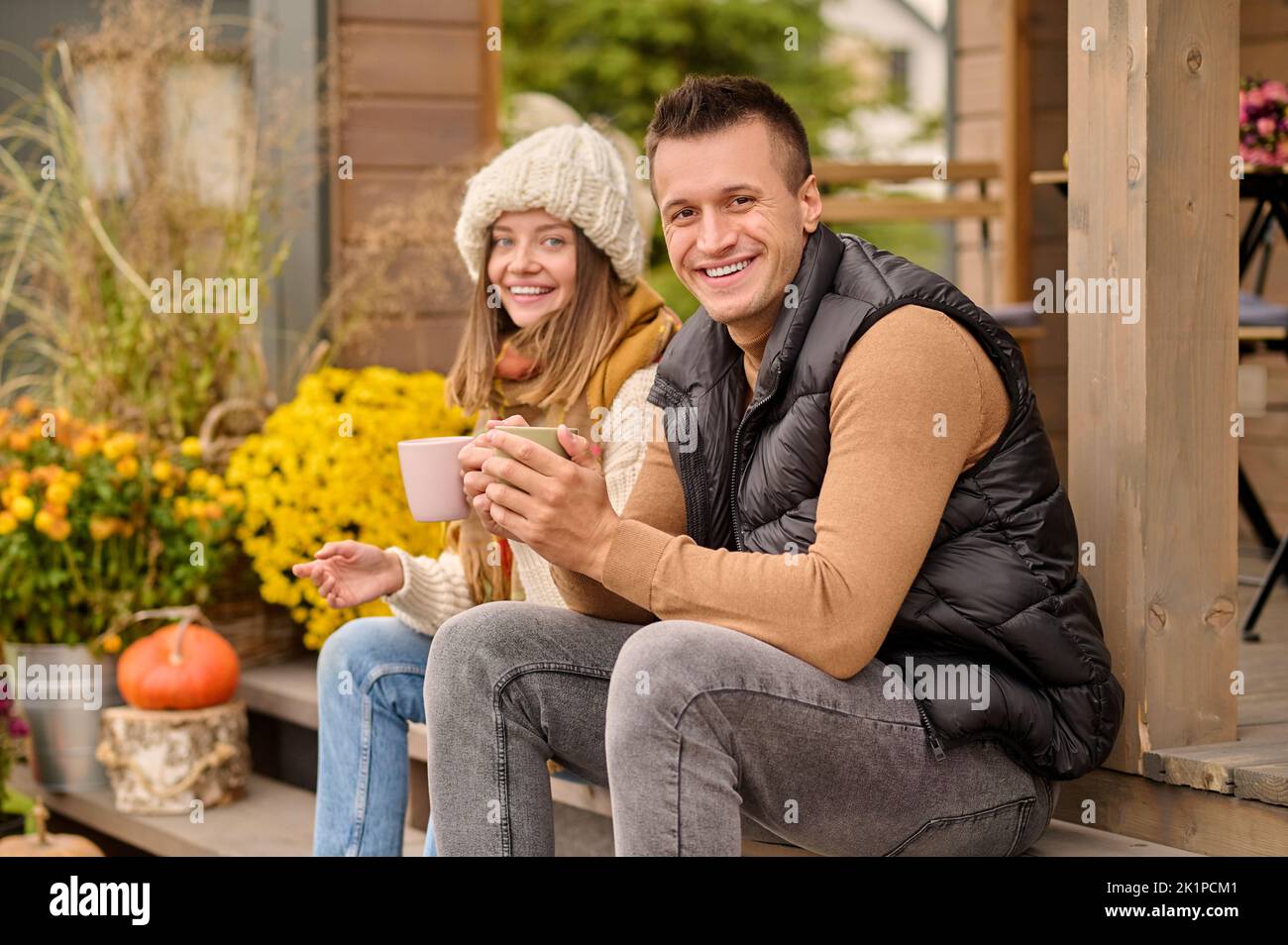 Young couple on veranda hi-res stock photography and images - Alamy