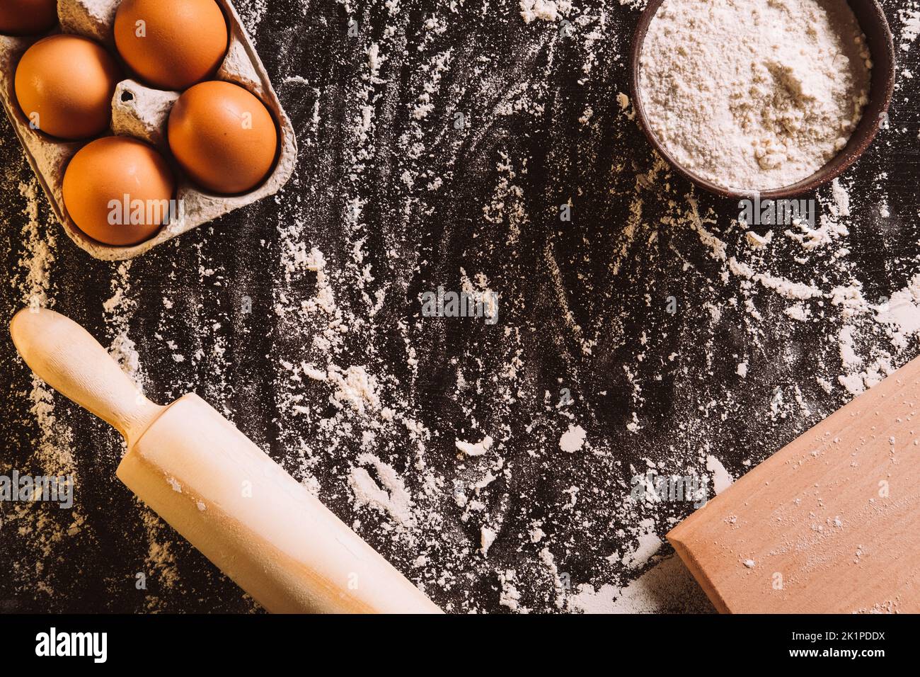 Culinary background. Bakery food ingredients. Cooking process. Black ...