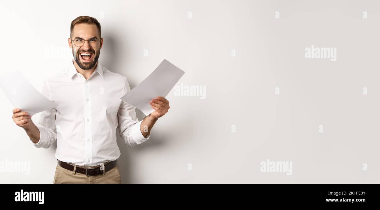Angry boss disappointed with documents, shouting mad and aggressive ...