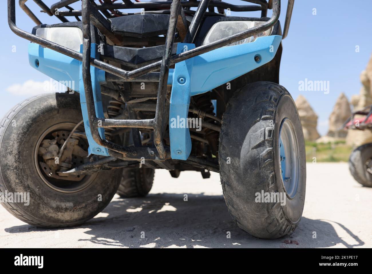 Old broken blue ATV in desert closeup Stock Photo - Alamy