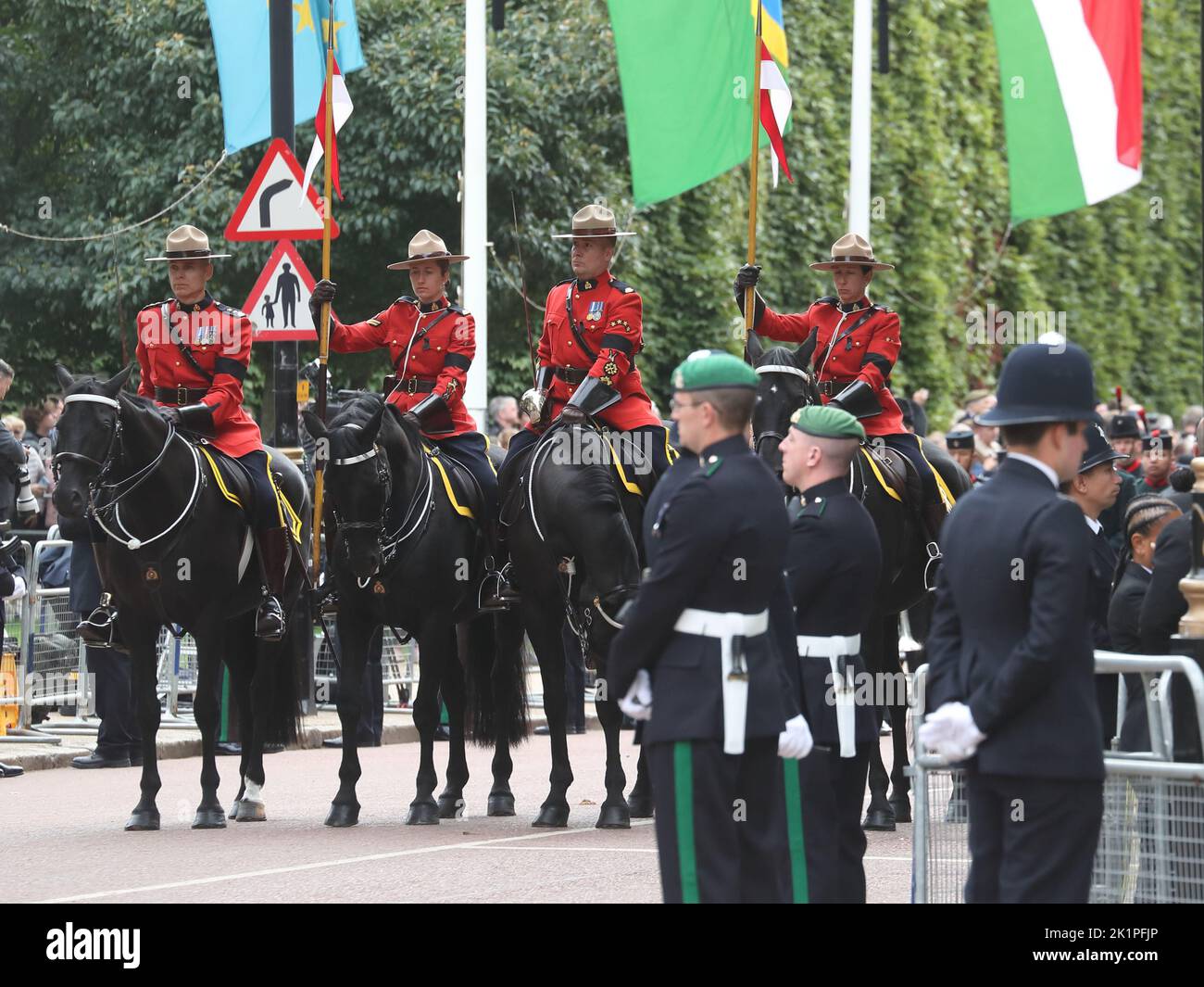 Royal Canadian Mounted Police lead the funeral procession for Queen ...