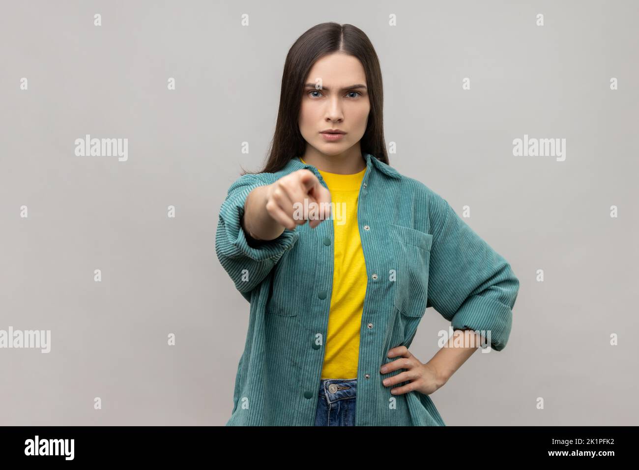 Hey you. Portrait of angry bossy woman pointing finger to camera ...