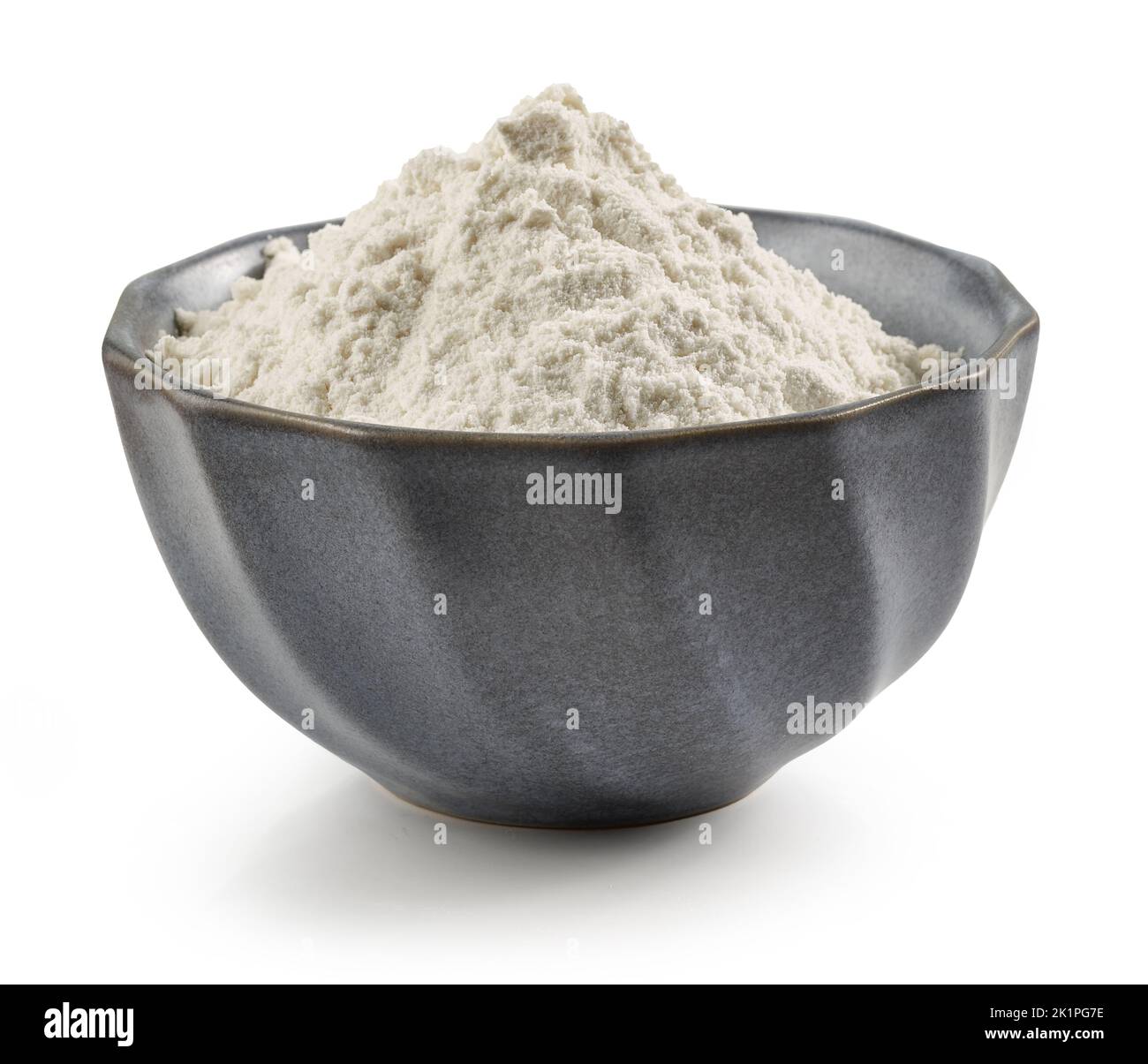 flour in ceramic bowl isolated on white background Stock Photo - Alamy