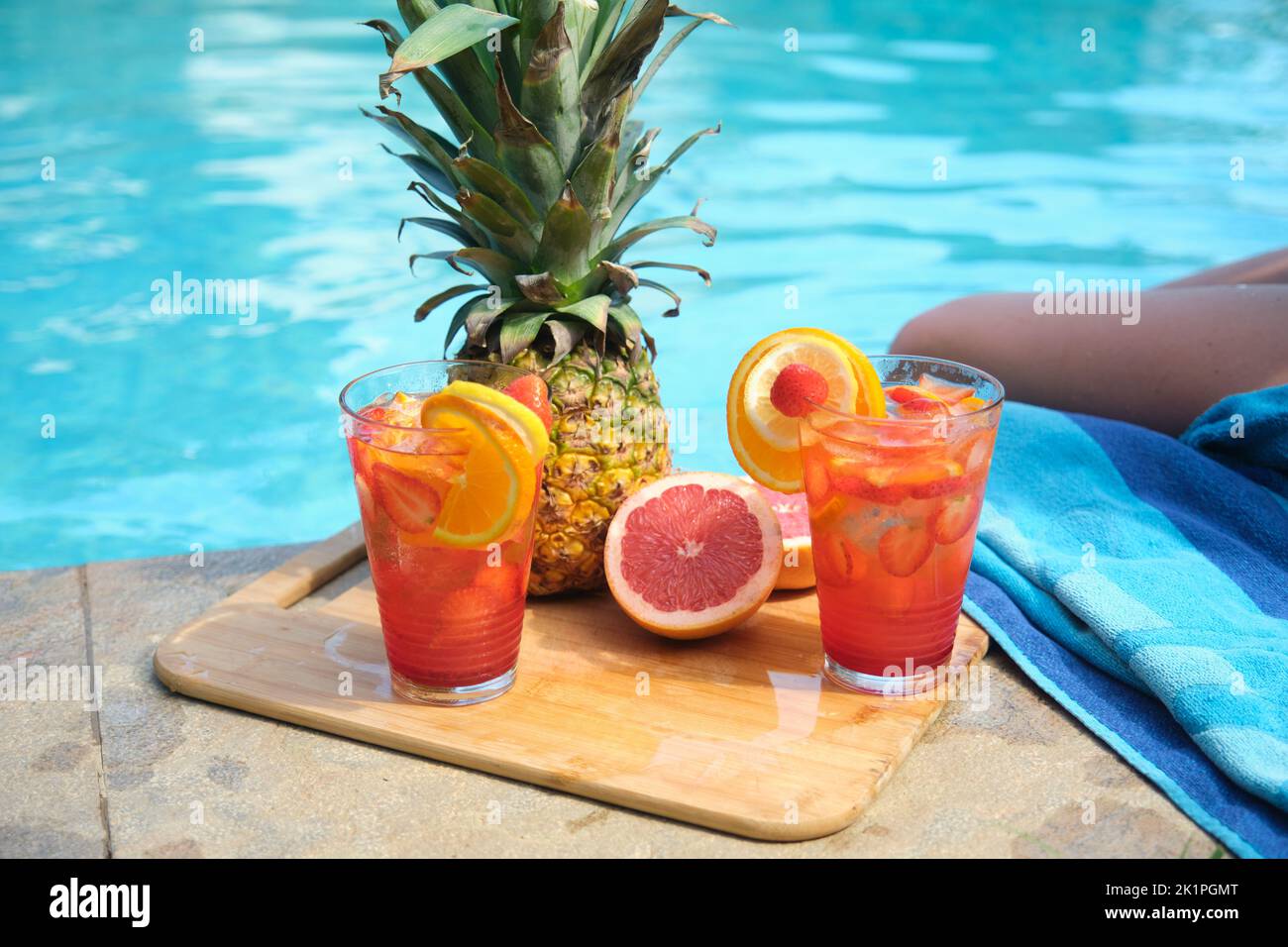 fruit cocktails by the pool Stock Photo - Alamy