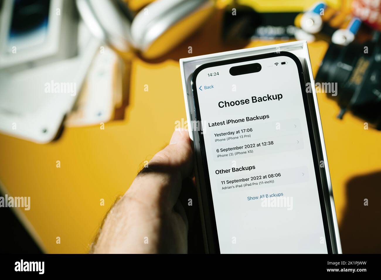 Paris, France - Sep 17, 2022: Male hand holding packge with new Apple Computers iPhone 14 Pro ...