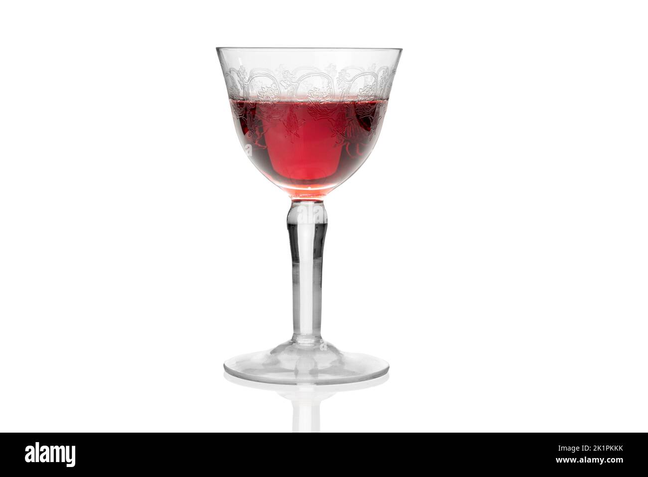 Glass of cherry, vintage glass decorated with red cherry liqueur ...
