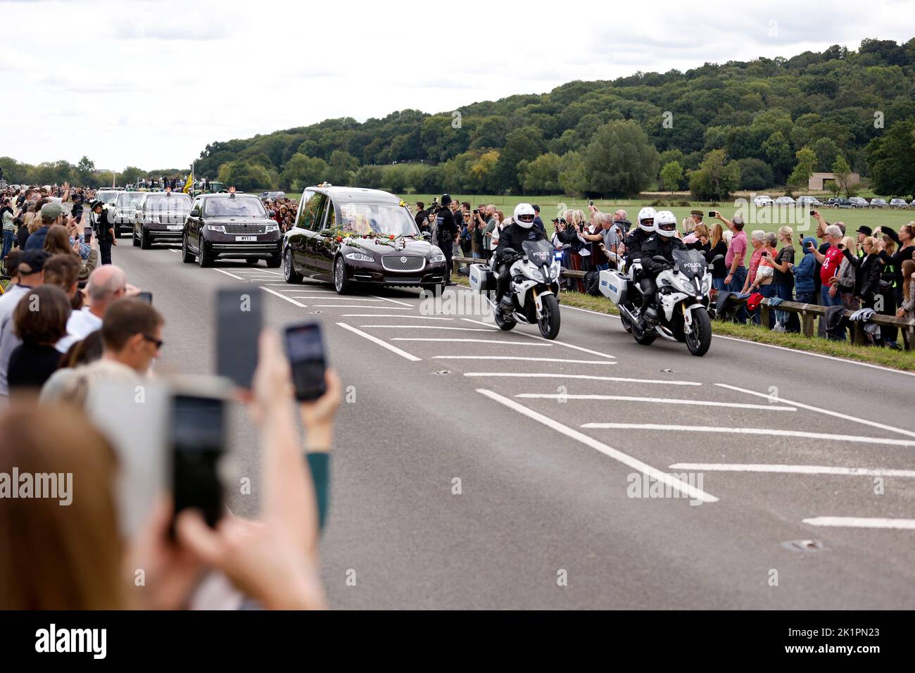 The State Hearse carries the coffin of Queen Elizabeth II, draped in ...