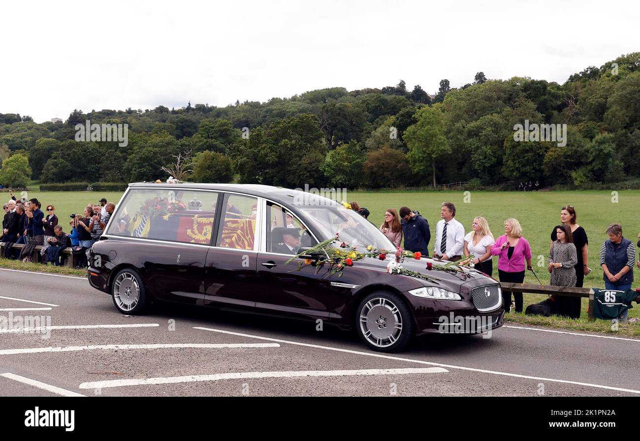 The State Hearse carries the coffin of Queen Elizabeth II, draped in ...