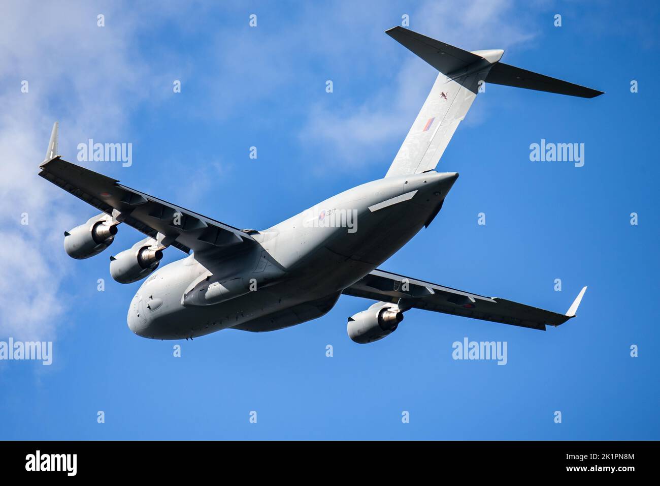 A closeup of Royal Airforce RAF Boeing against a blue sky background ...