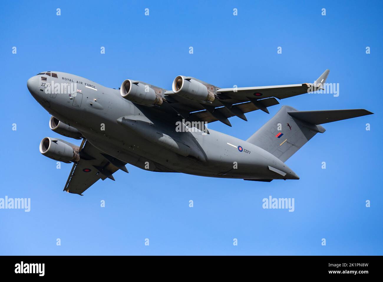 A closeup of Royal Airforce RAF Boeing against a blue sky background ...