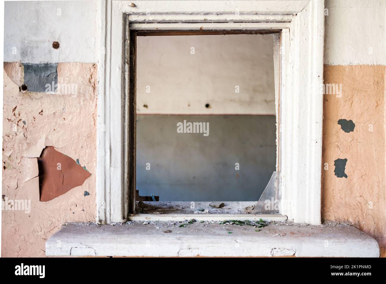 A small window inside an abandoned building Stock Photo - Alamy