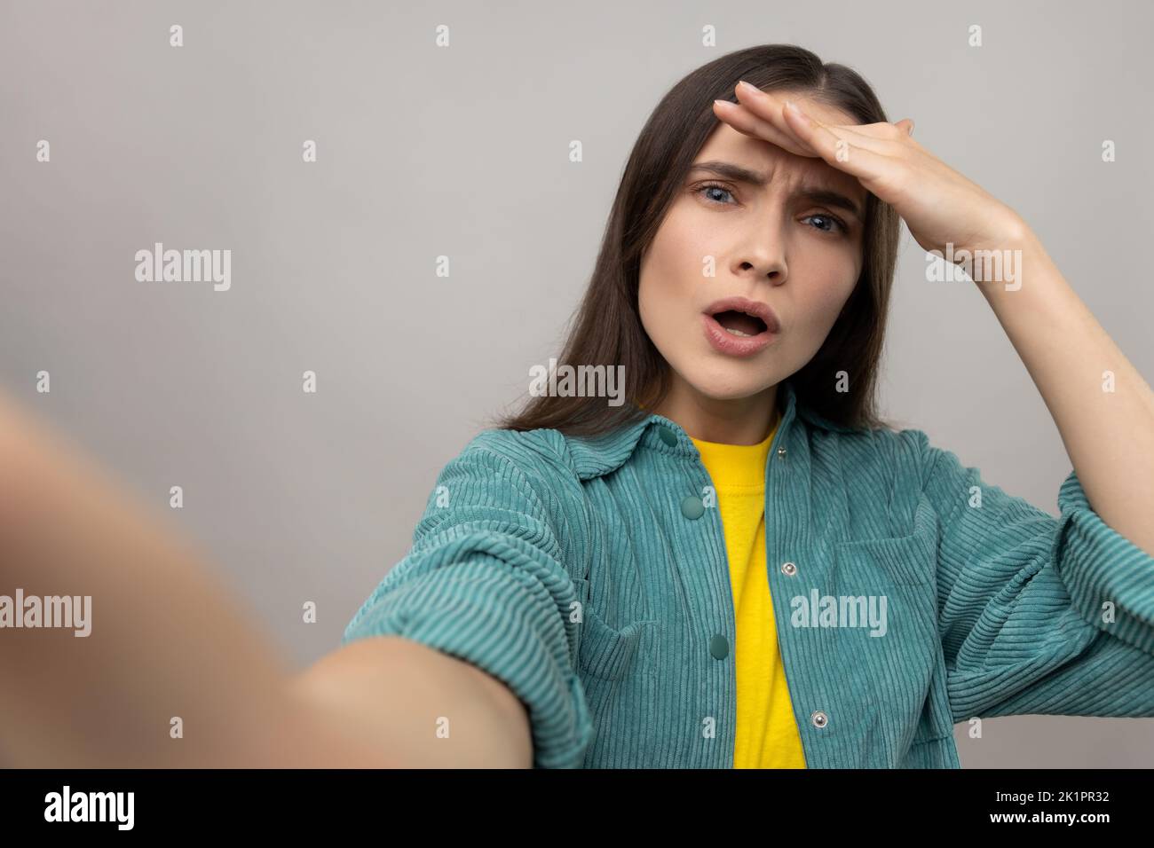 Portrait of astonished woman with amazed face expression, making selfie ...