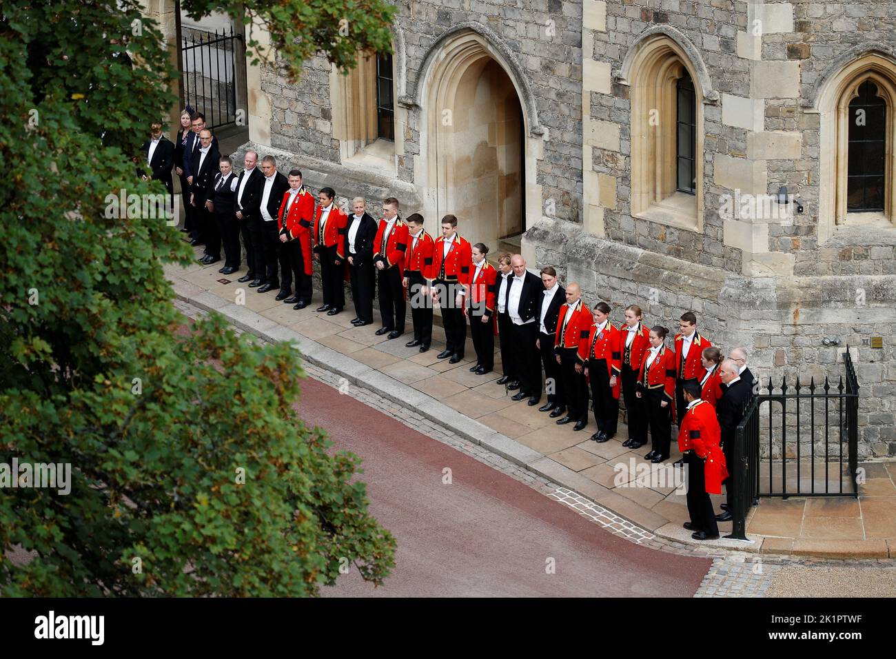 Household staff await the cortege of Queen Elizabeth II at Windsor ...