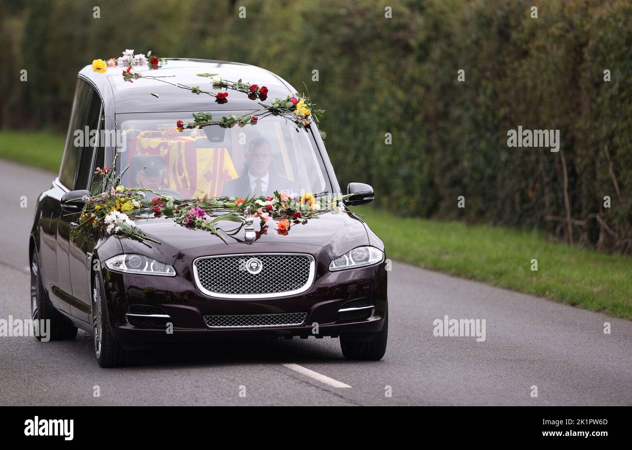 The State Hearse carrying the coffin of Queen Elizabeth, draped in the ...