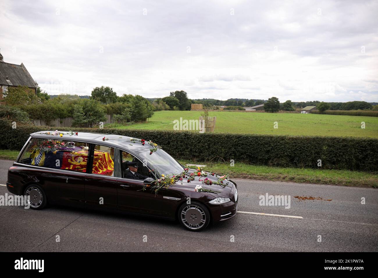The State Hearse carrying the coffin of Queen Elizabeth, draped in the ...
