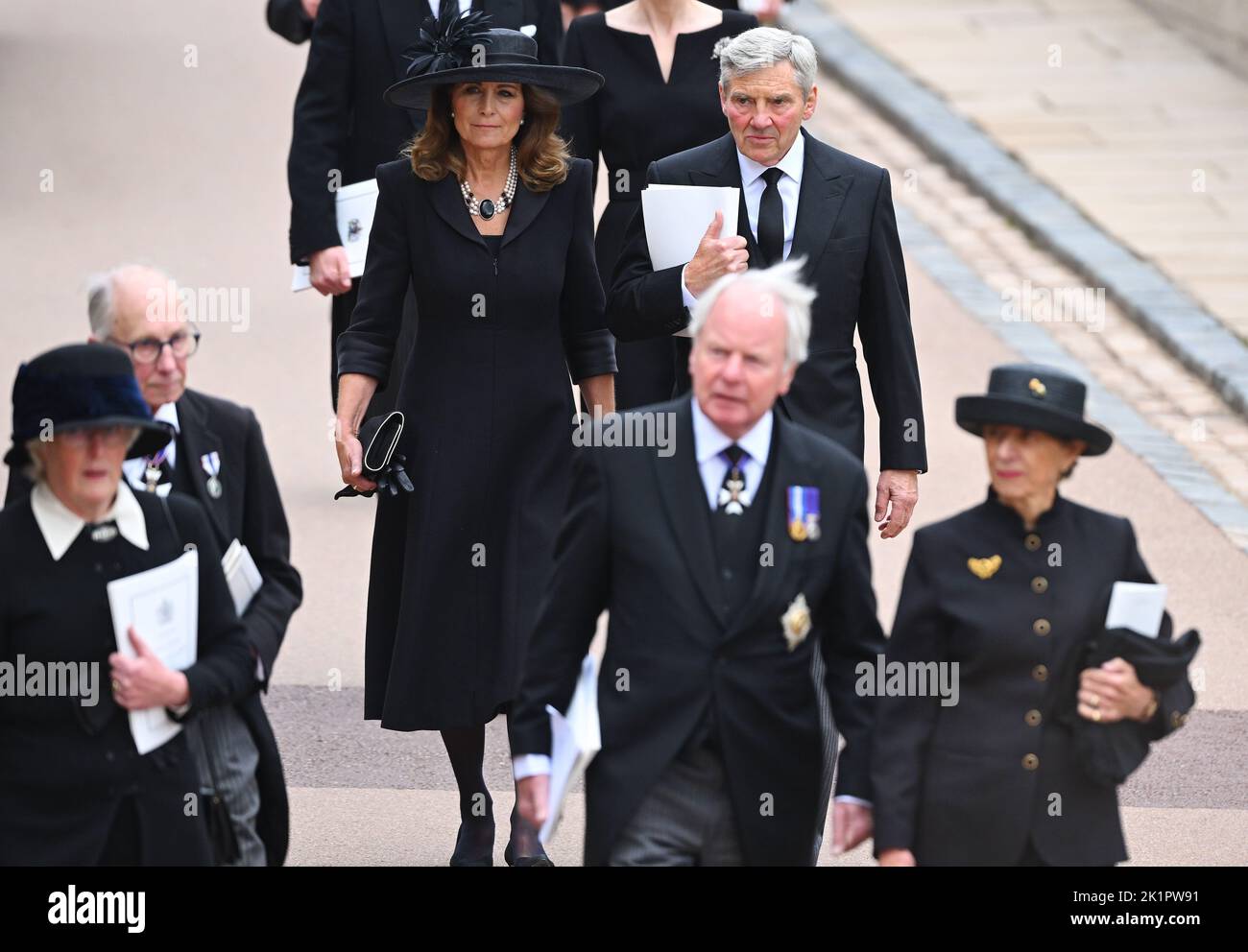 Carole and Michael Middleton (rear) arrive for the Committal Service ...