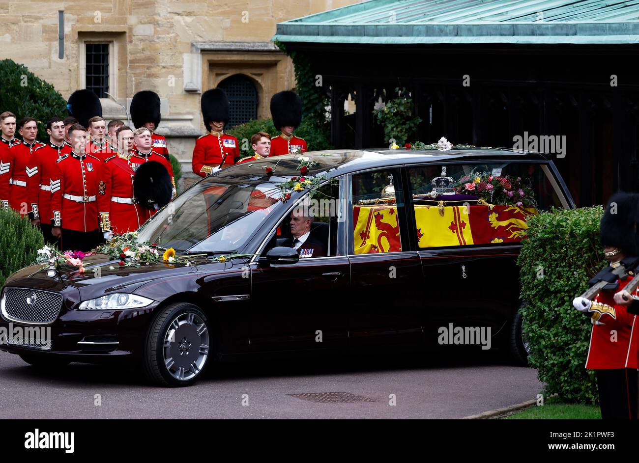 The State Hearse carries the coffin of Queen Elizabeth II, draped in the Royal Standard with the ...