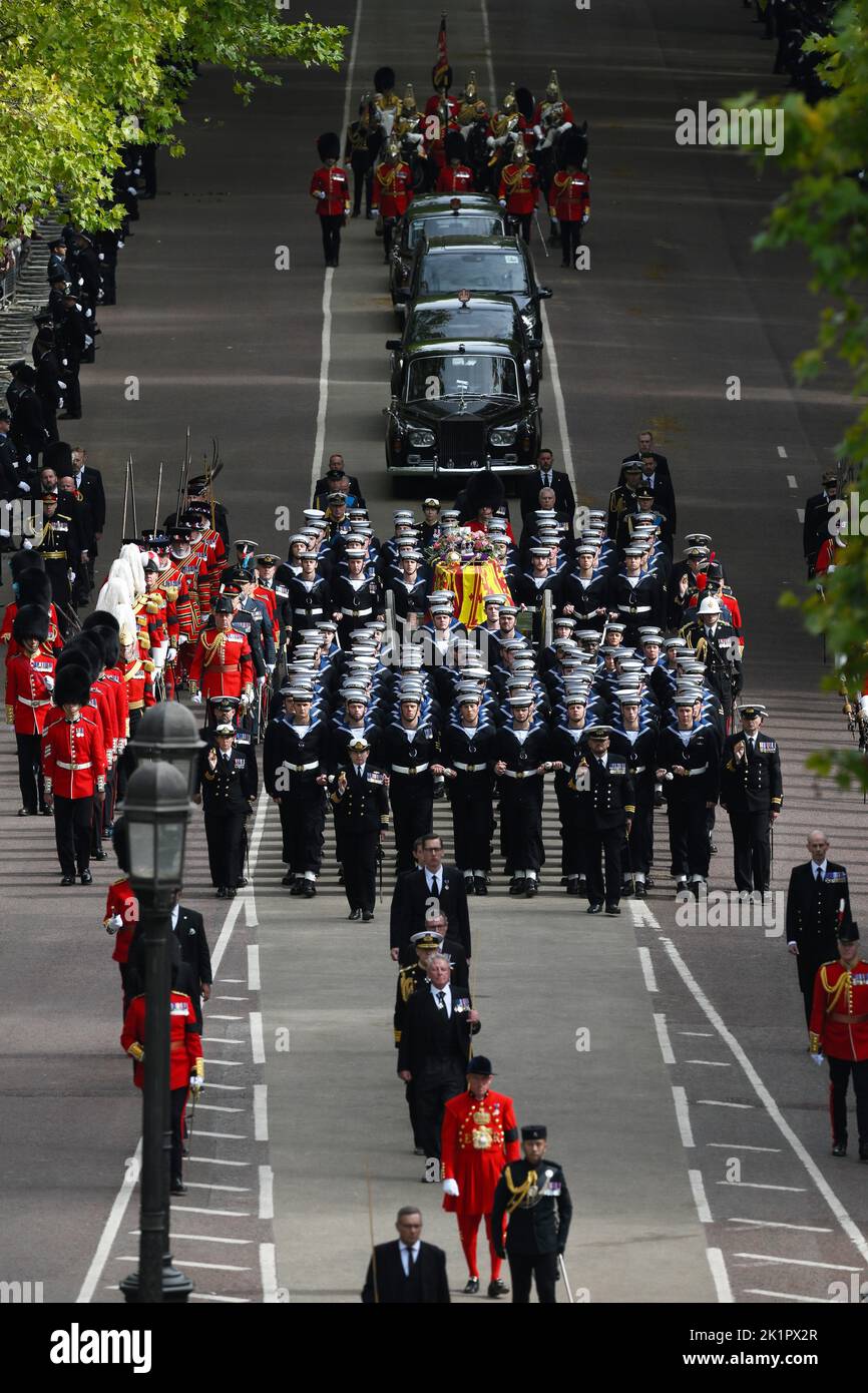 The State Gun Carriage carries the coffin of Queen Elizabeth II, draped ...