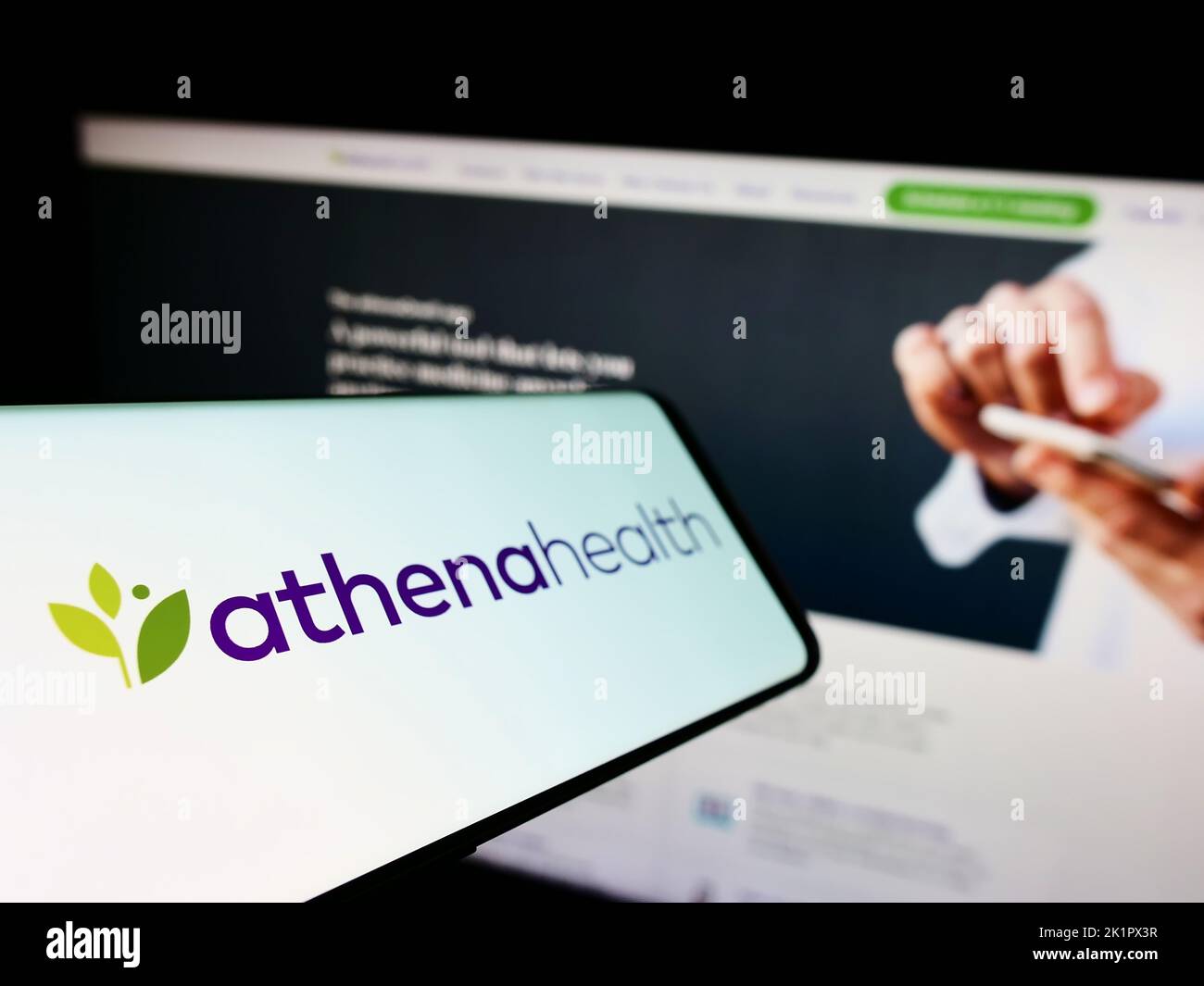Smartphone with logo of American healthcare company Athenahealth Inc ...