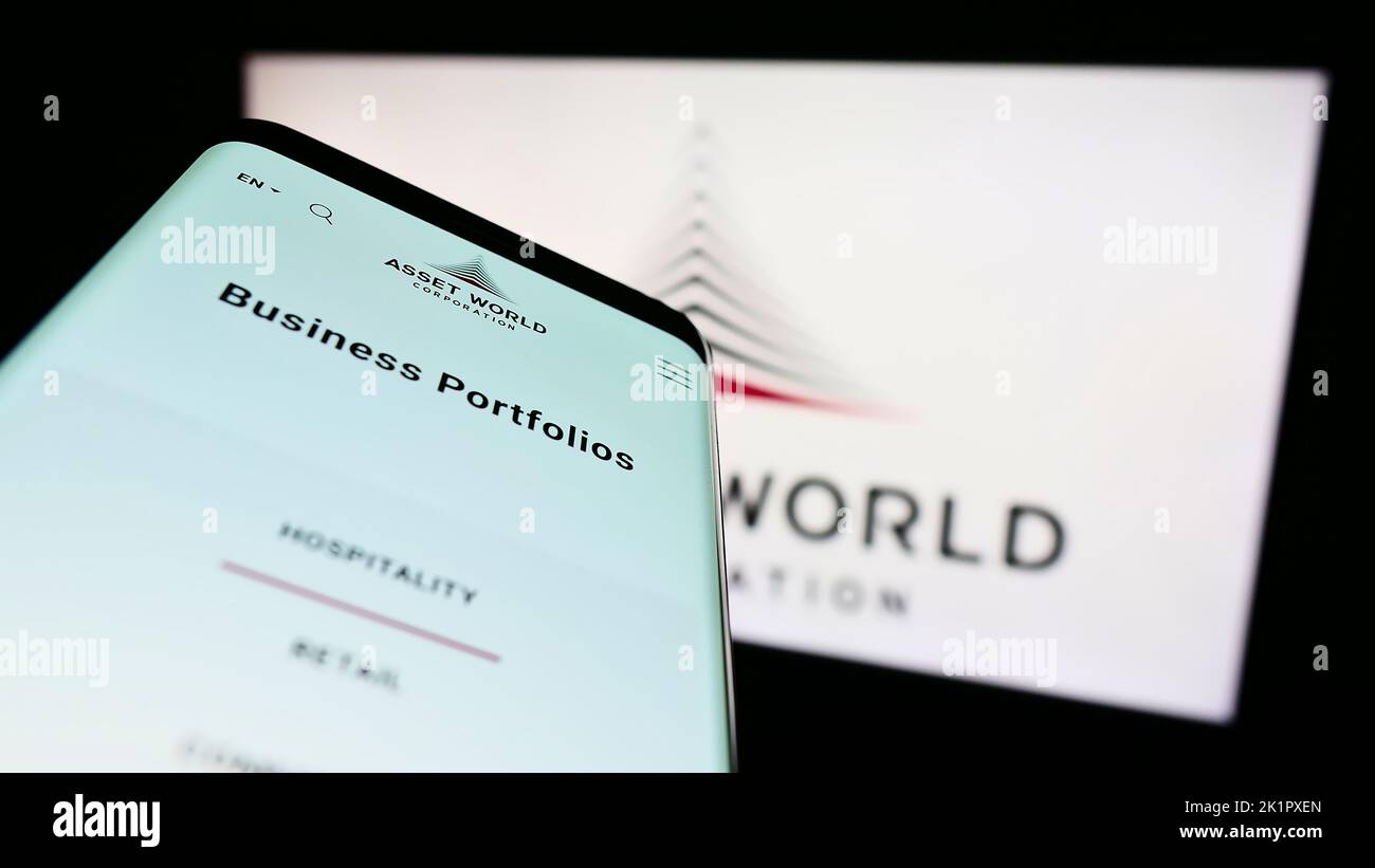 Mobile phone with webpage of Thai real estate company Asset World ...