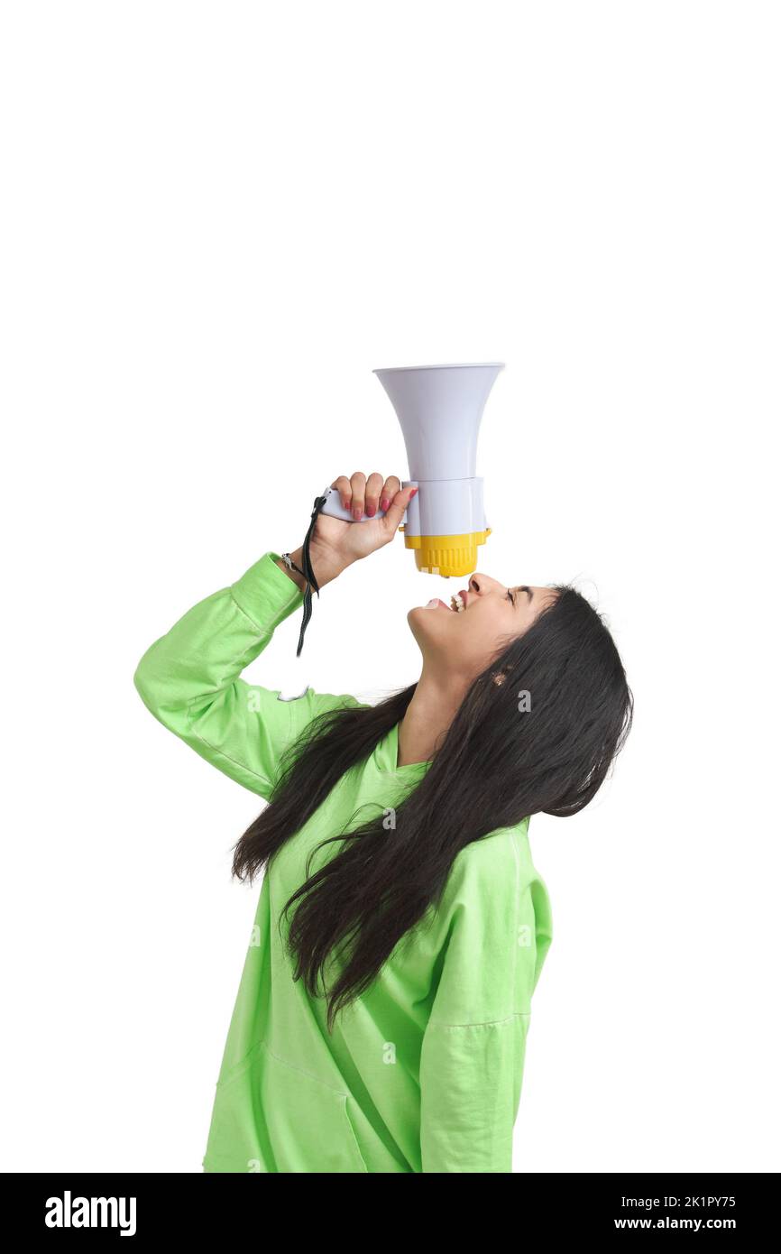 Young Venezuelan woman shouting through megaphone, isolated Stock Photo ...
