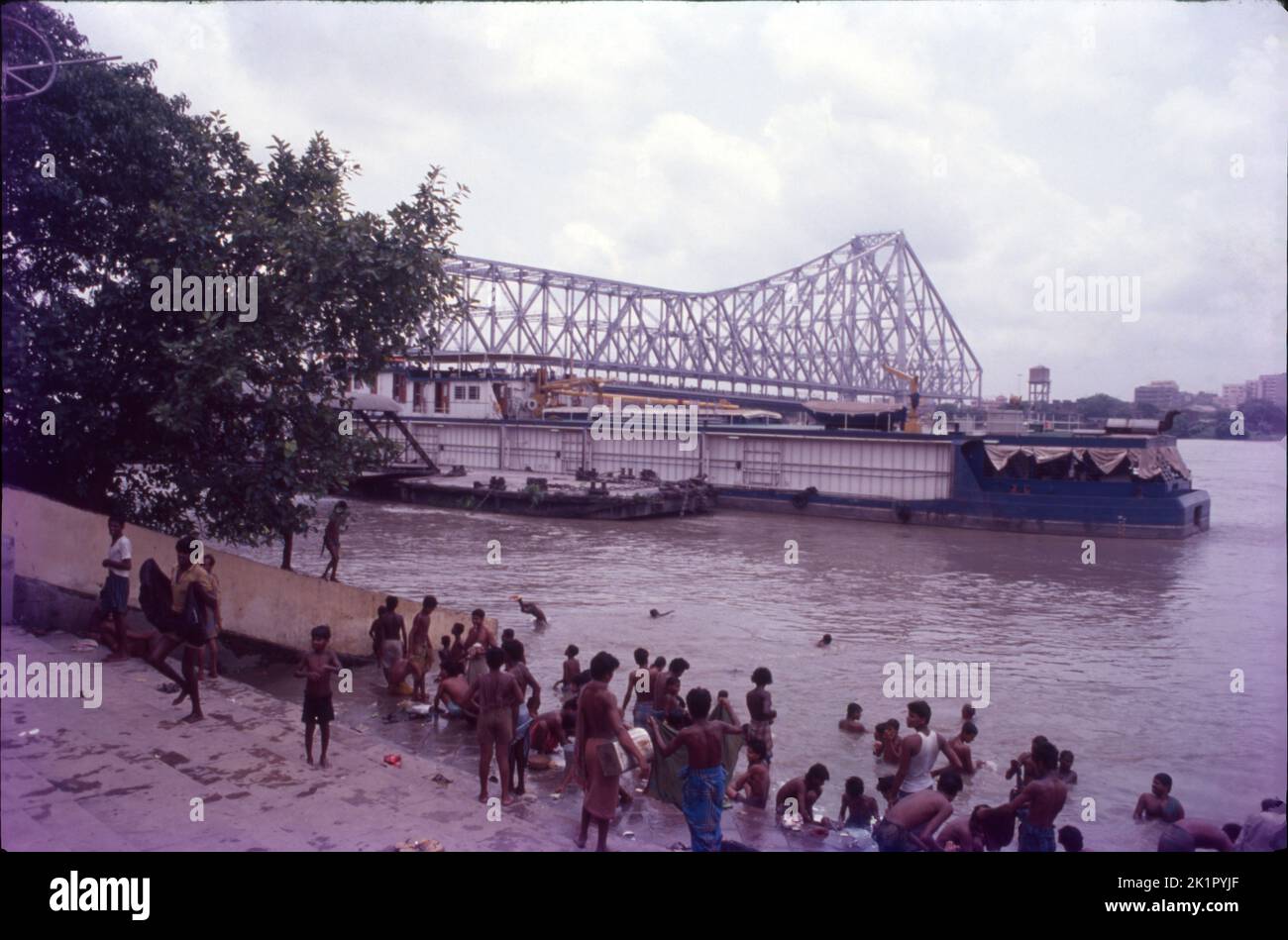 Bathing at Ganga Ghat, Calcutta, Hawda Bridge in Background Stock Photo ...