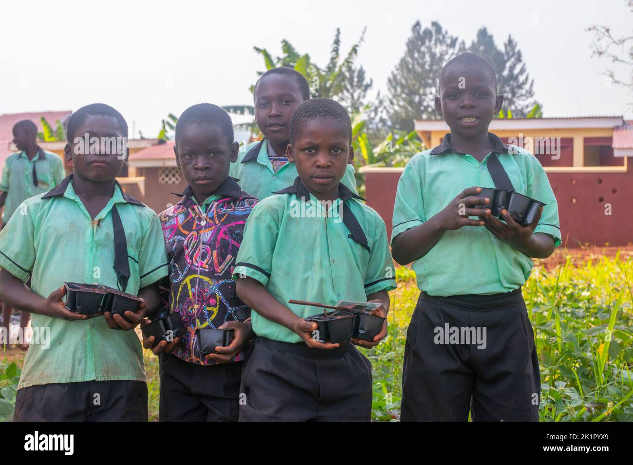 School kids were preparing their land to plant several fruit and ...
