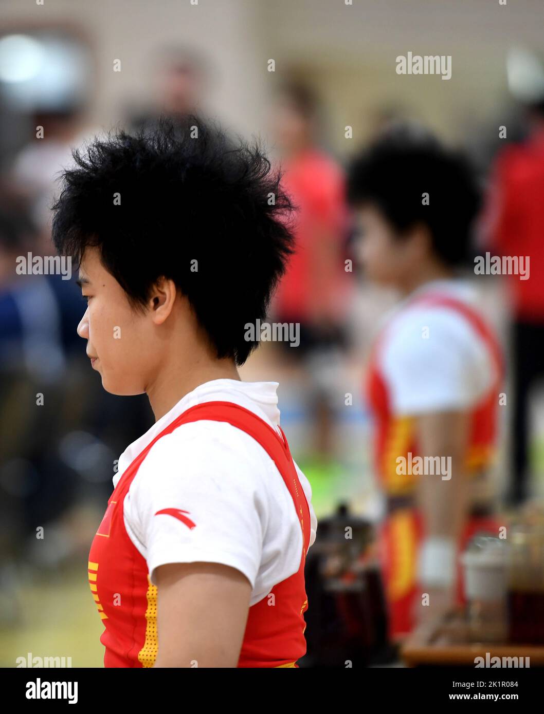 Beijing, China. 20th Sep, 2022. Hou Zhihui reacts after the women's 49kg event of the China's ...