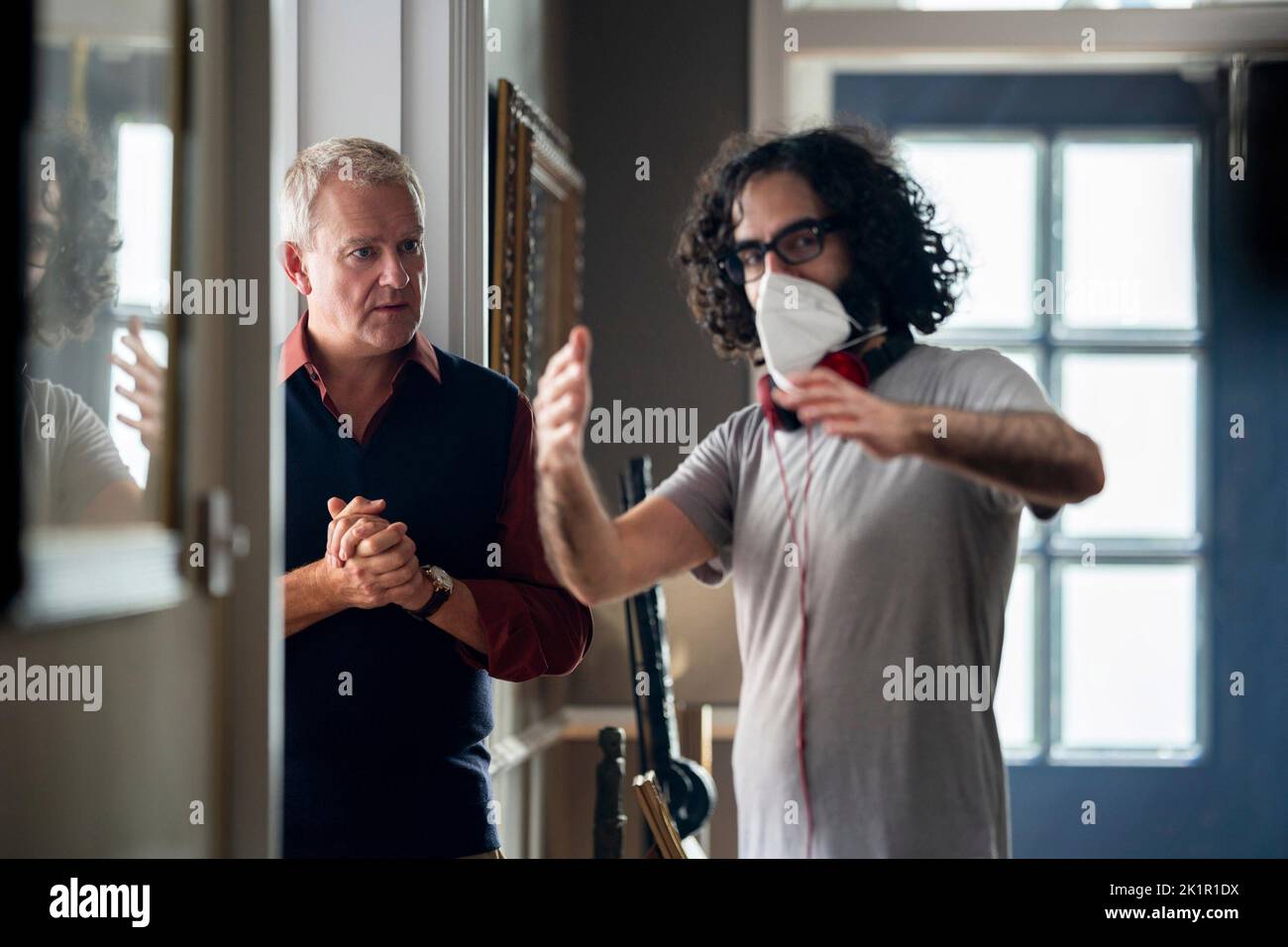 I CAME BY, from left: Hugh Bonneville, director Babak Anvari, on set ...