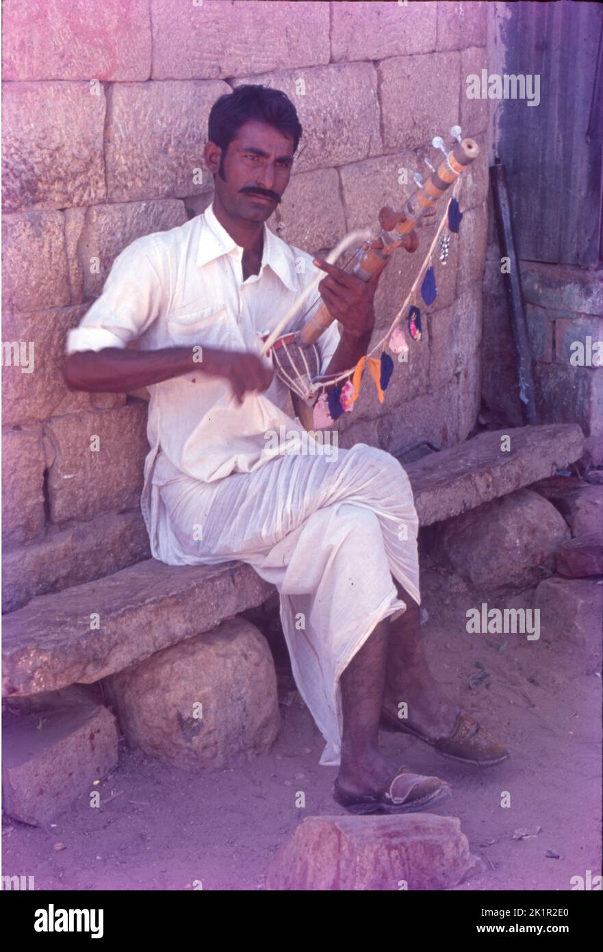 Portrait of sarangi player hi-res stock photography and images - Alamy