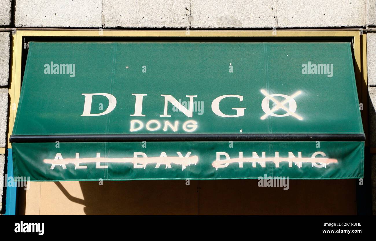Green awning for the shut down Dingo restaurant with the name altered to read Ding Dong Madrid ...