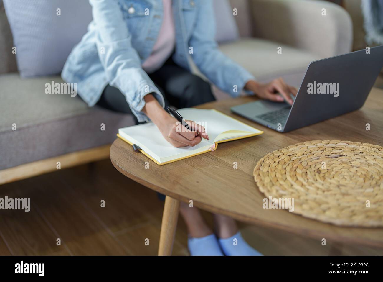 African Americans using notebooks, pens to take notes and computers ...